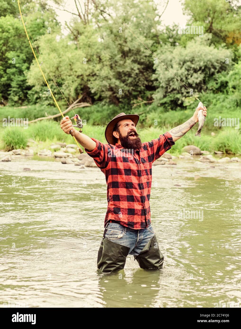 male hobby. hobby and sport activity. fisherman show fishing technique ...