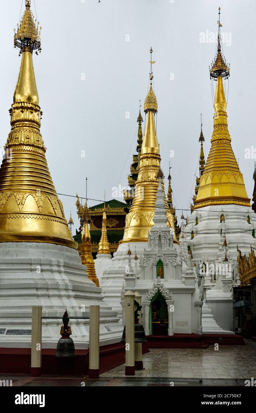The magnificent gold plated stupas surrounding the Shwedagon Pagoda in ...