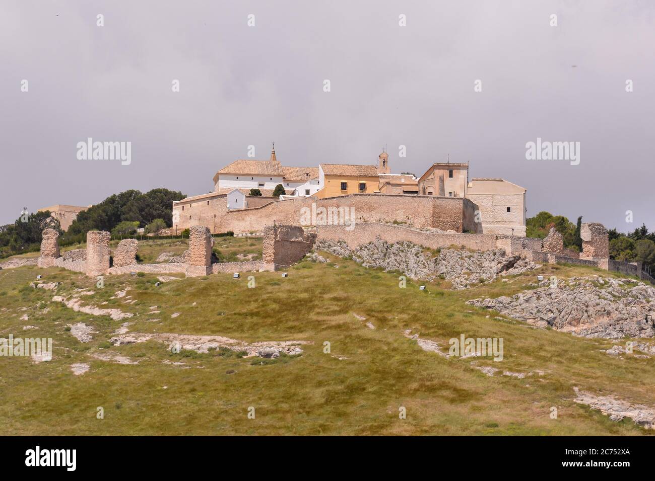 View of whitewashed village and surrounding countryside with a castle ...