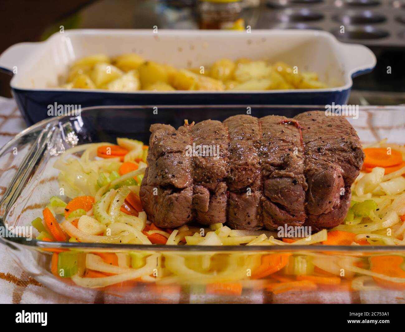 A traditional Sunday Roast meal of a topside roast beef and potatoes on ...