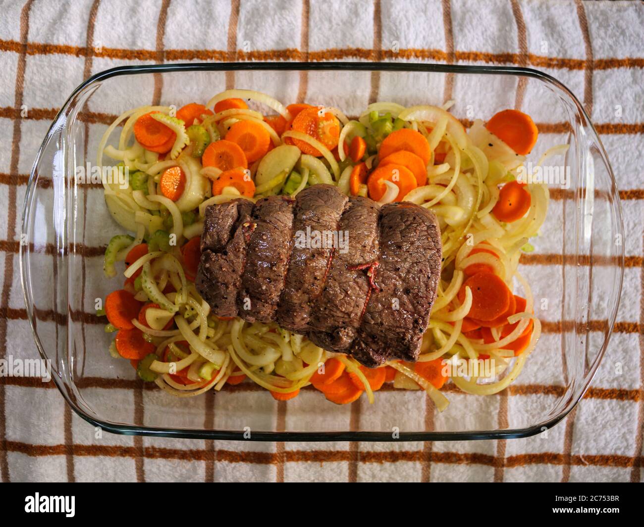 A traditional Sunday Roast meal of a topside roast beef and potatoes on ...