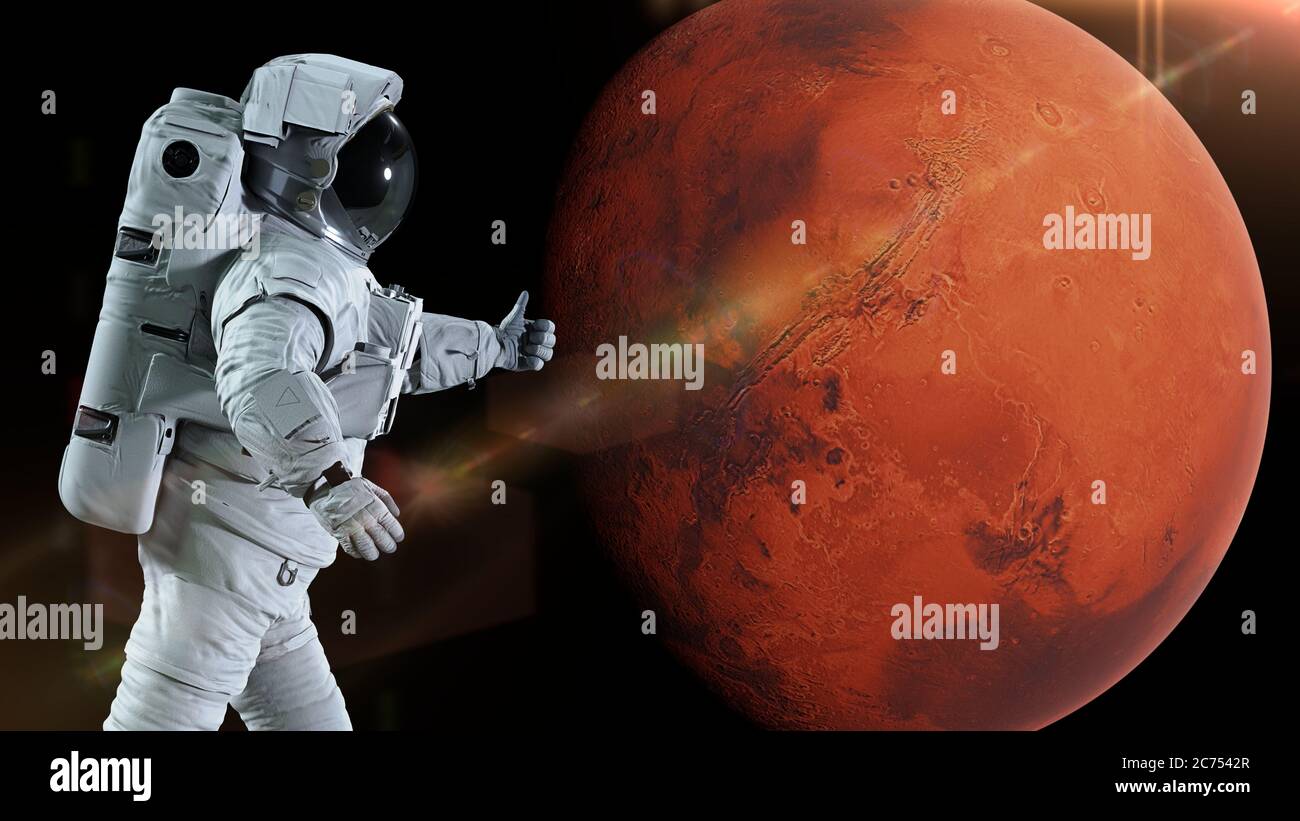 astronaut showing thumbs up in front of planet Mars Stock Photo - Alamy