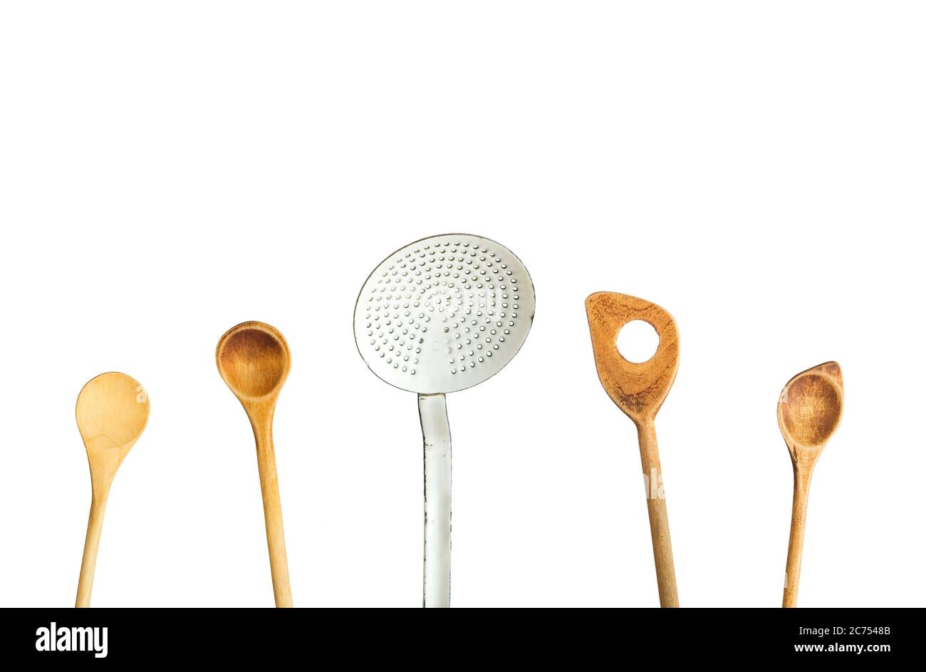 Vintage kitchen utensils, spatulas, grinder, skimmer, isolated white ...
