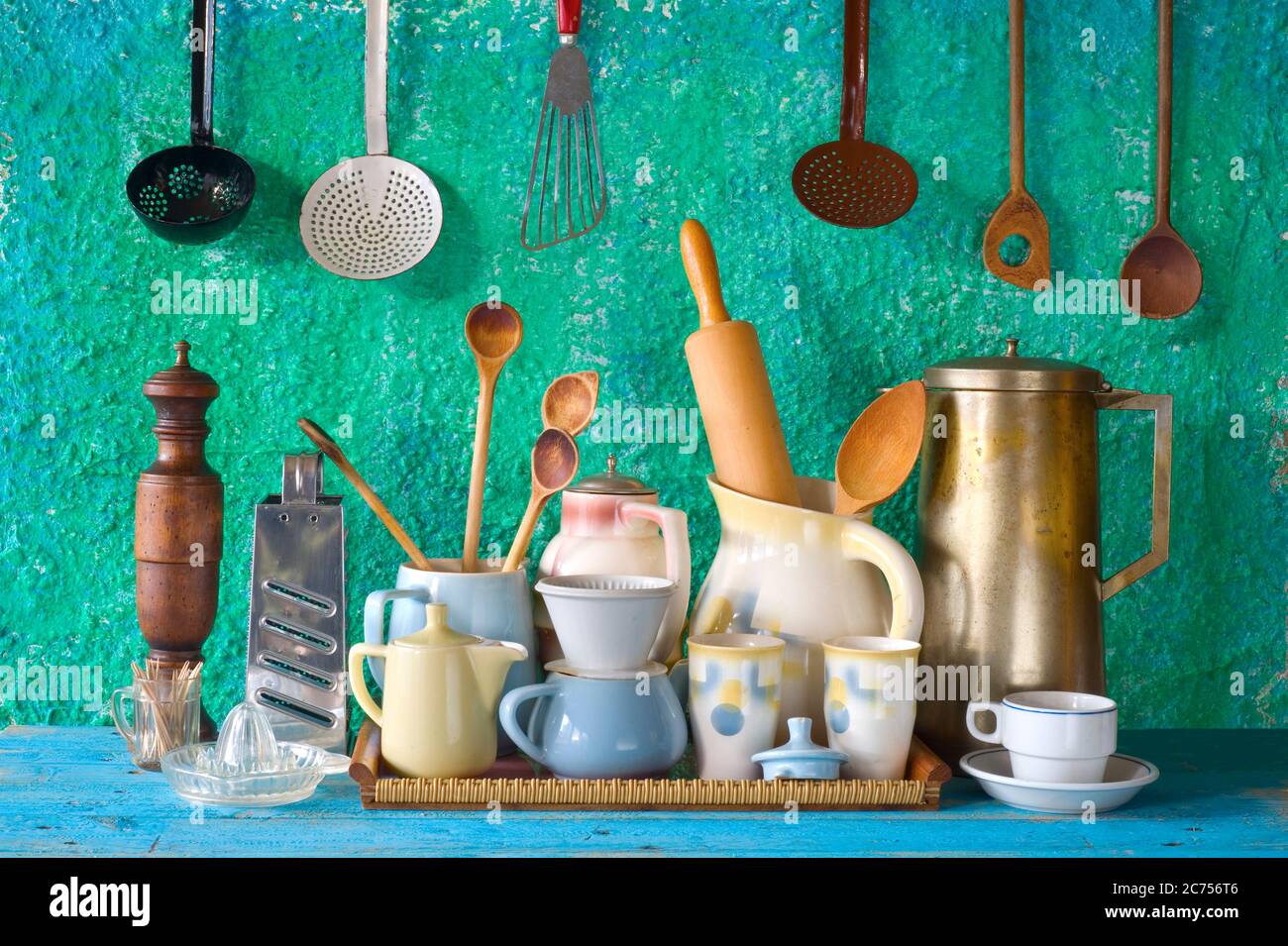 collection of vintage kitchenware, green background Stock Photo - Alamy