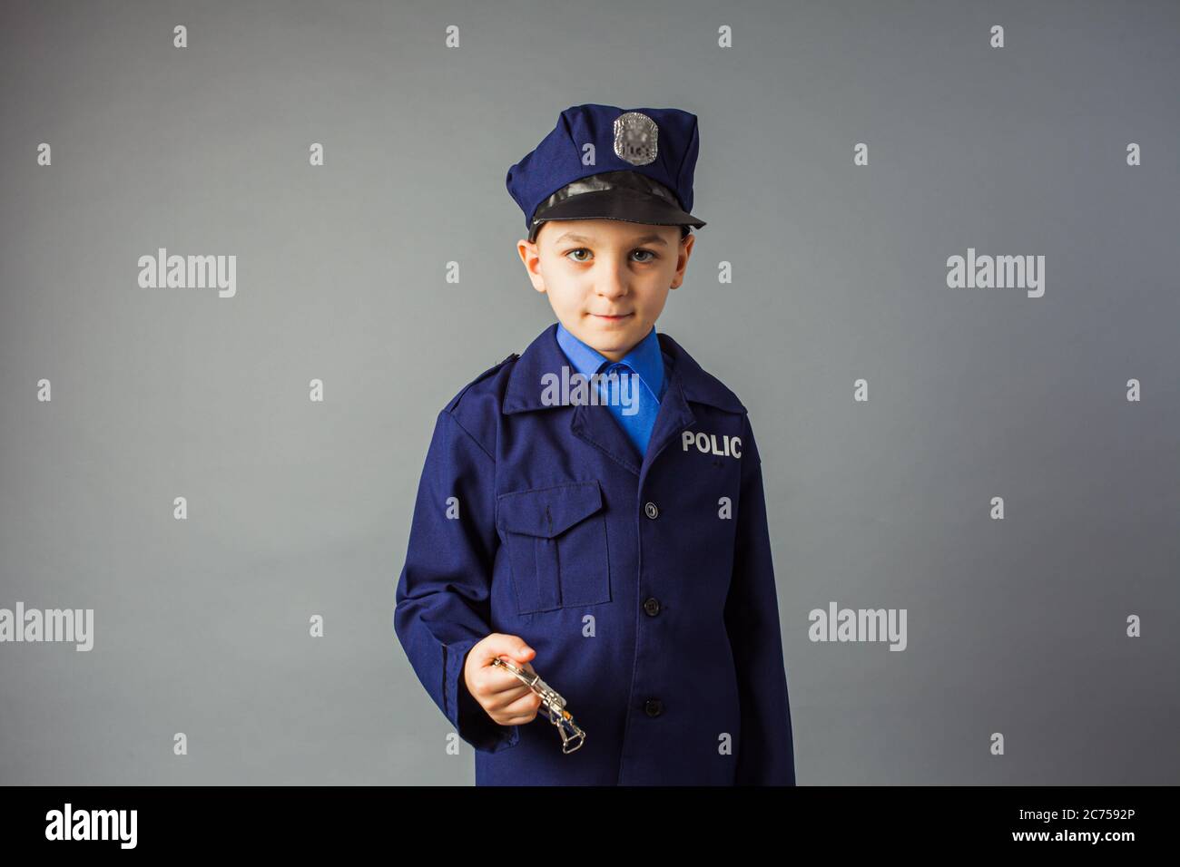 Police boy handcuffs hi-res stock photography and images - Alamy