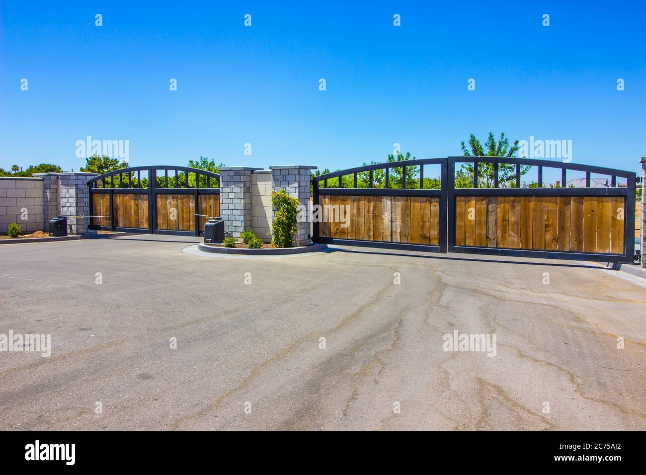 Two Automatic Traffic Gates For Ingress/Egress Stock Photo - Alamy