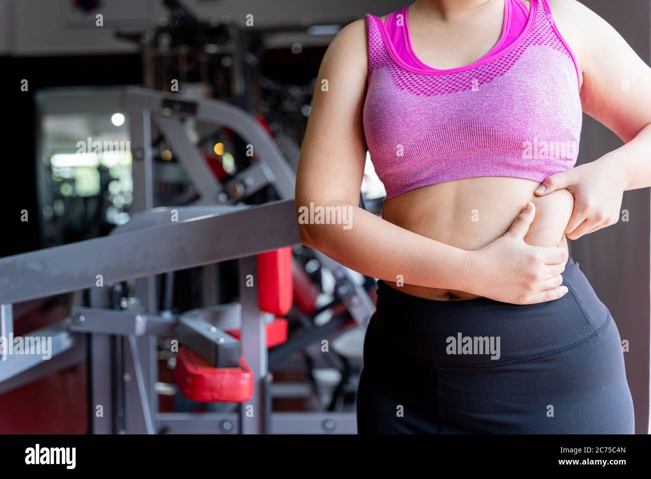 Fat woman holding excessive fat belly, overweight fatty belly at ...
