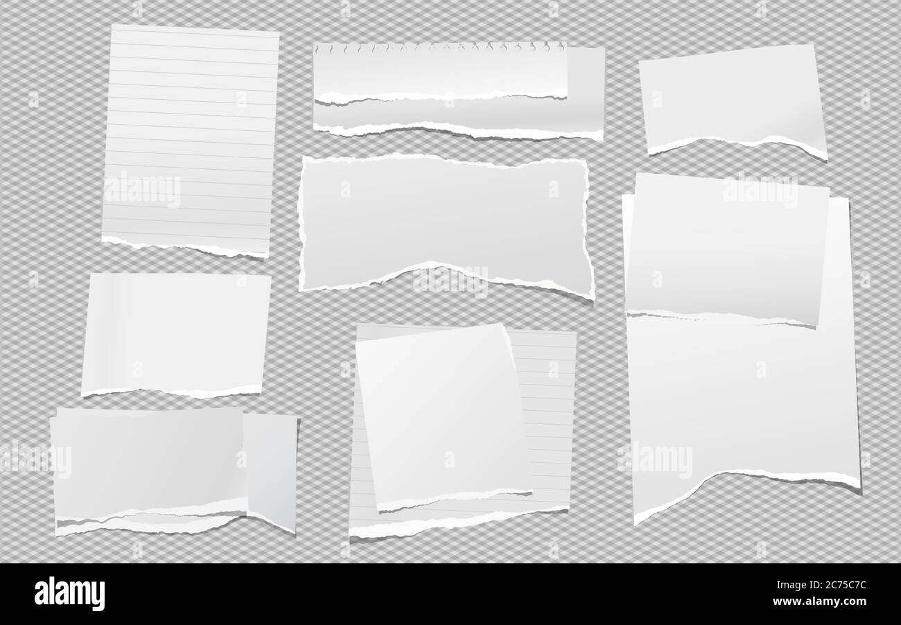 Torn of white note, notebook paper strips and pieces stuck on dark grey ...