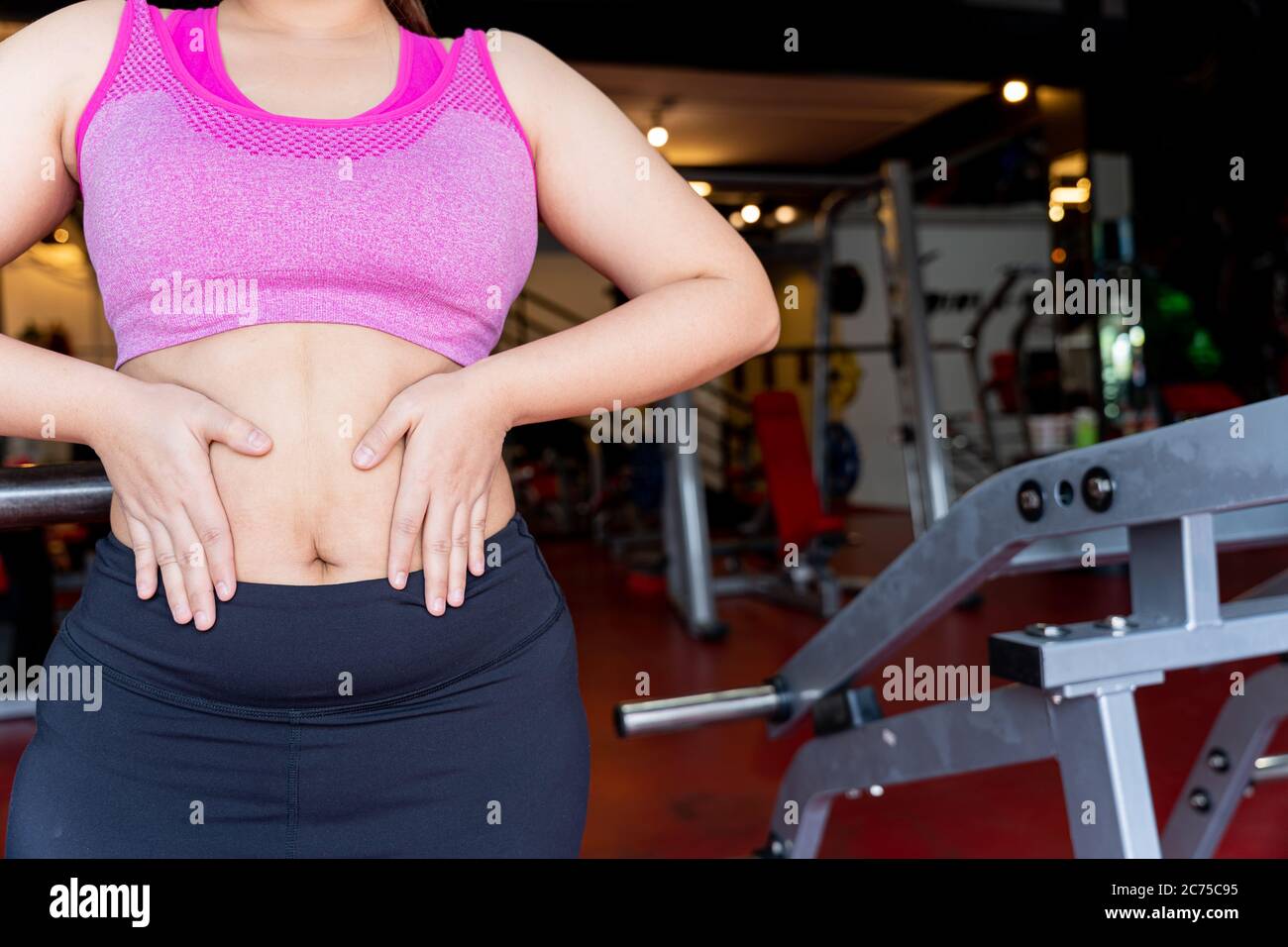Fat woman holding excessive fat belly, overweight fatty belly at ...