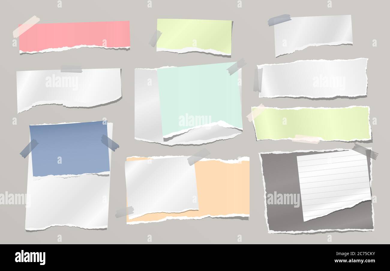 Torn of white and colorful note, notebook paper strips and pieces stuck ...