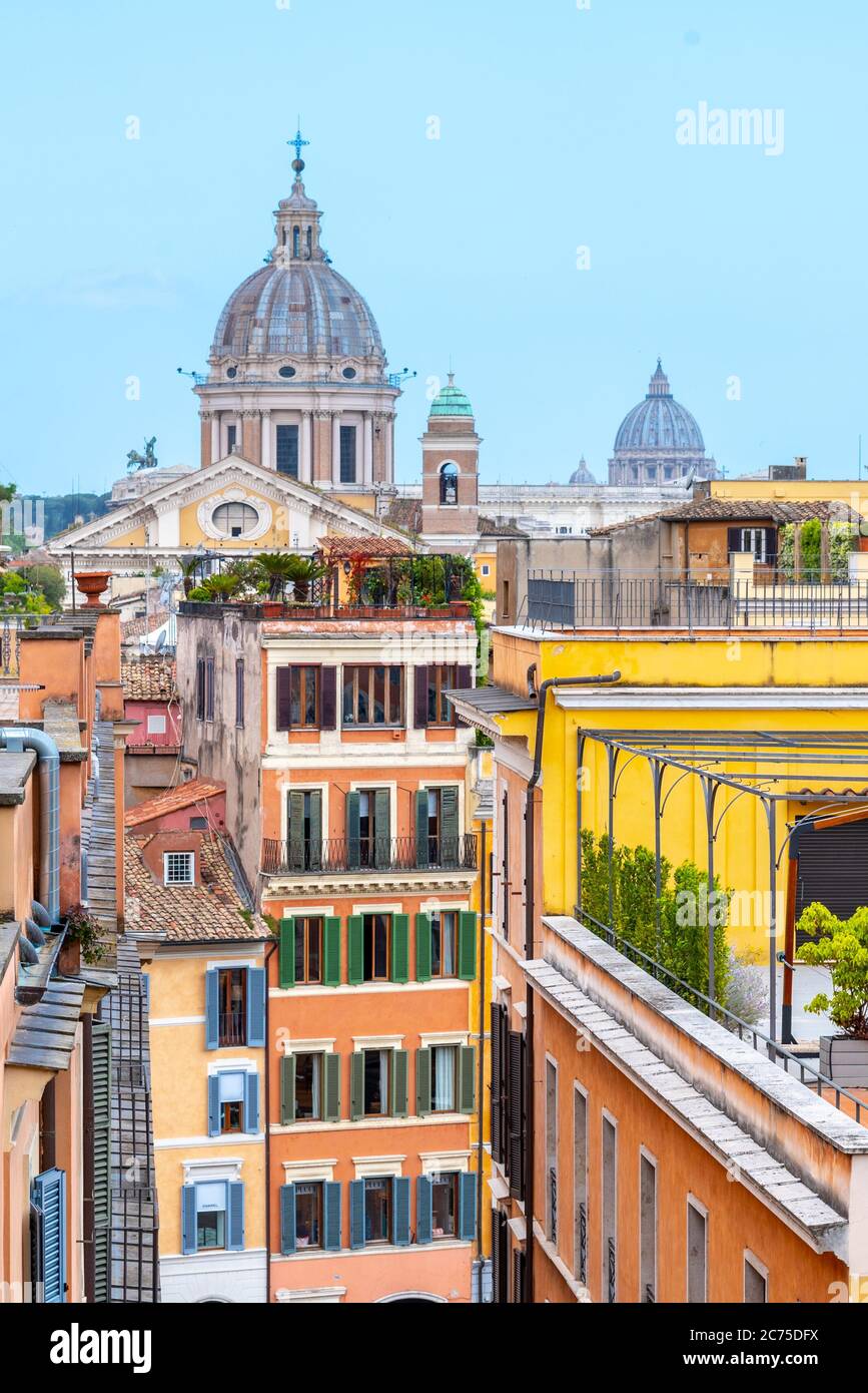 Rome skyline with old colorful houses and rooftop terraces on sunny day ...