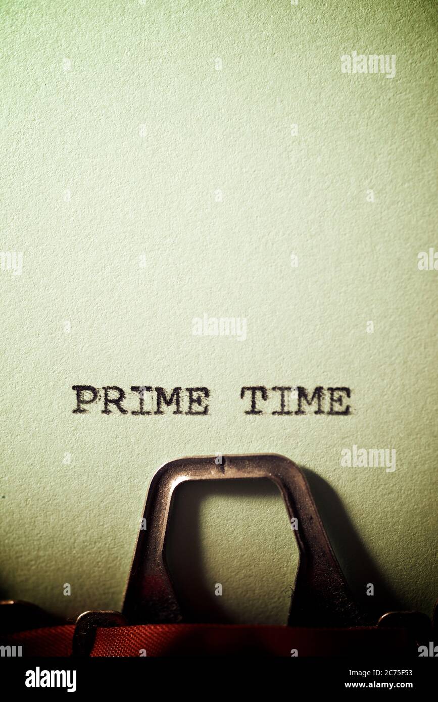 Prime time text written with a typewriter Stock Photo - Alamy