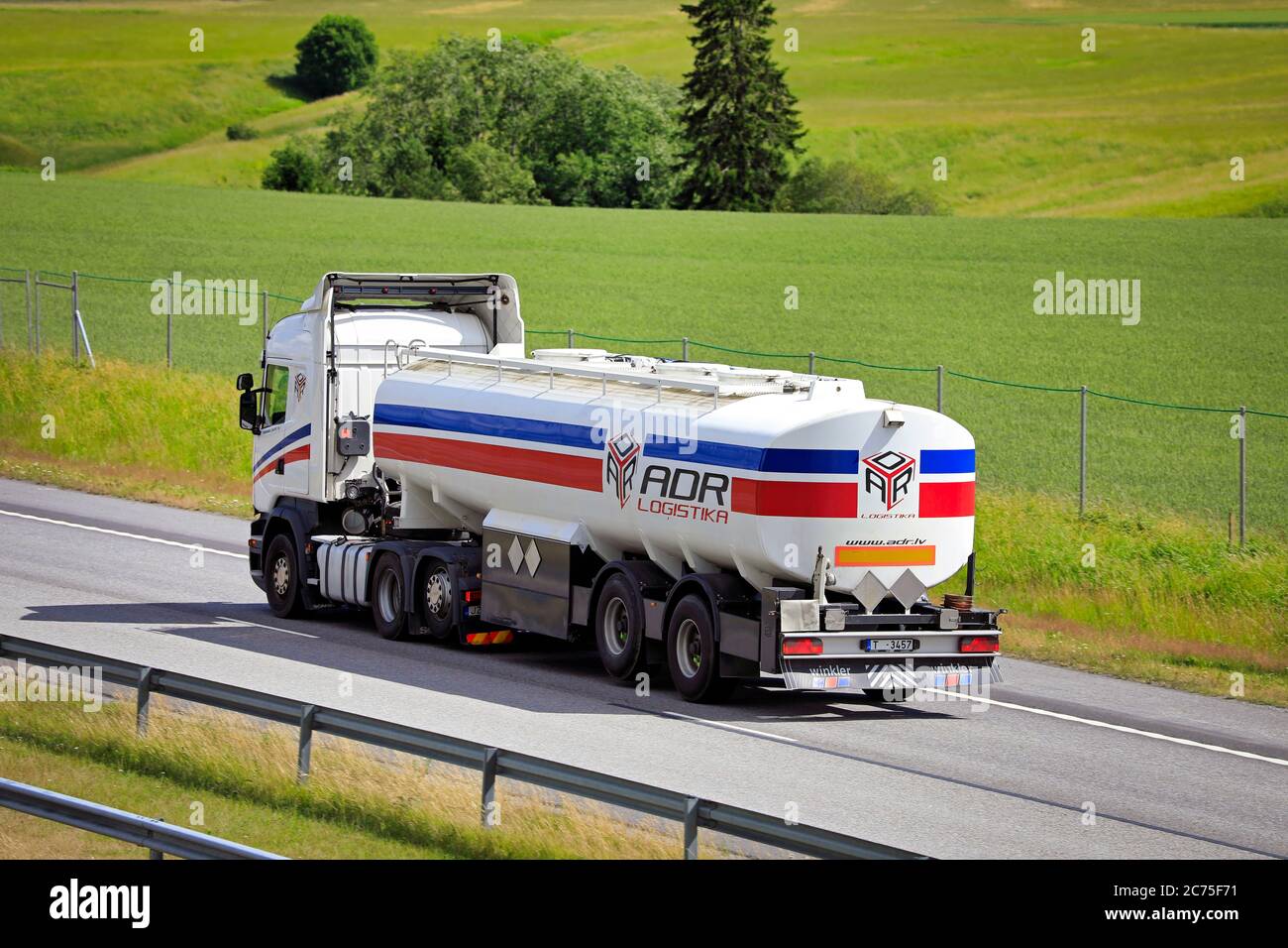 White Scania R450 semi tank truck ADR Logistica at speed on Finnish ...