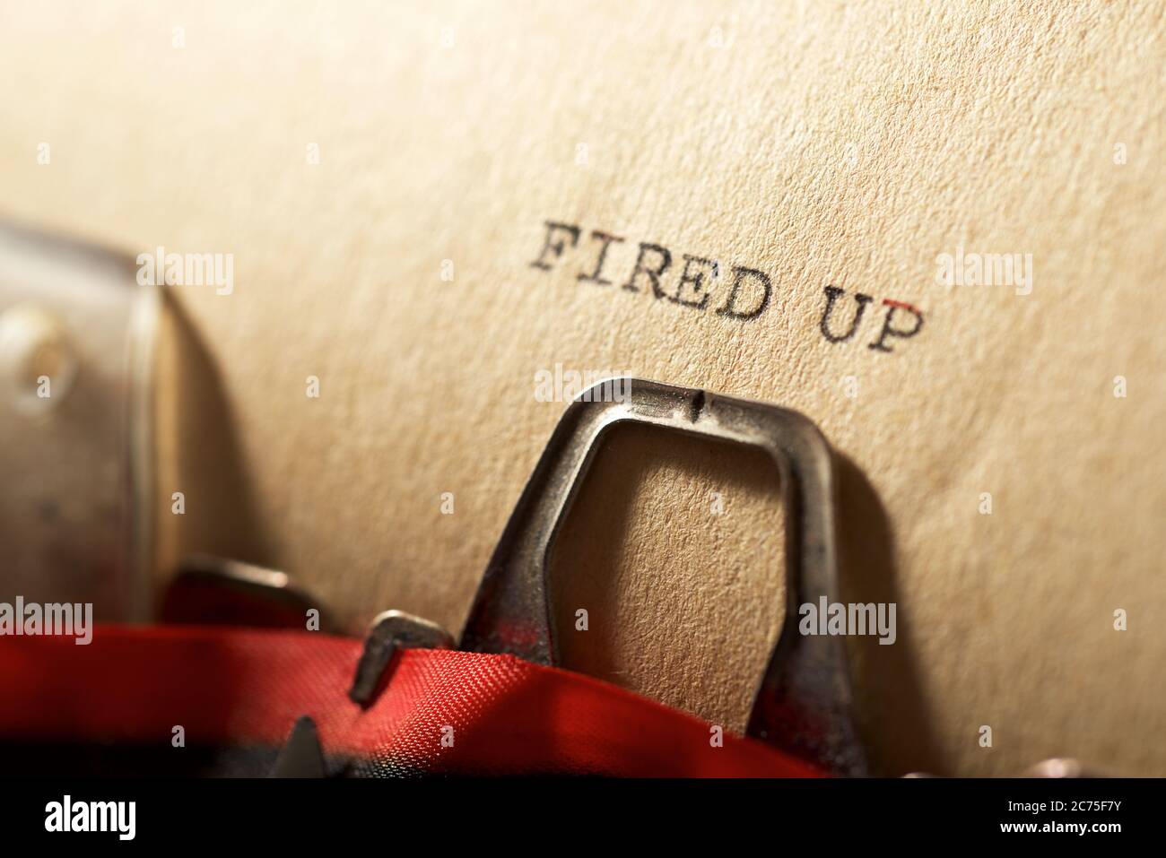 Fired up text written with a typewriter Stock Photo - Alamy
