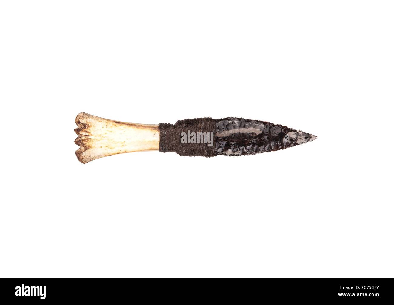 Obsidian knife with bone handle isolate on a white background ...