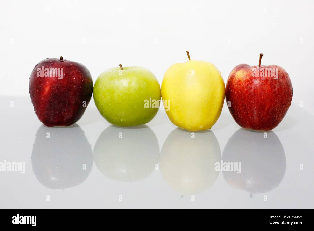 Four types of apples Stock Photo - Alamy