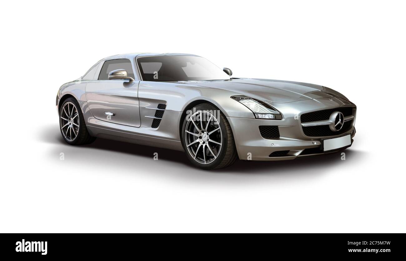 Premium sport car side view isolated on white Stock Photo - Alamy