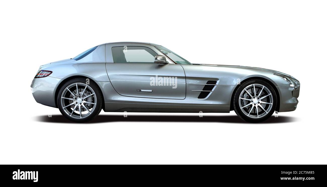 Premium sport car side view isolated on white Stock Photo - Alamy