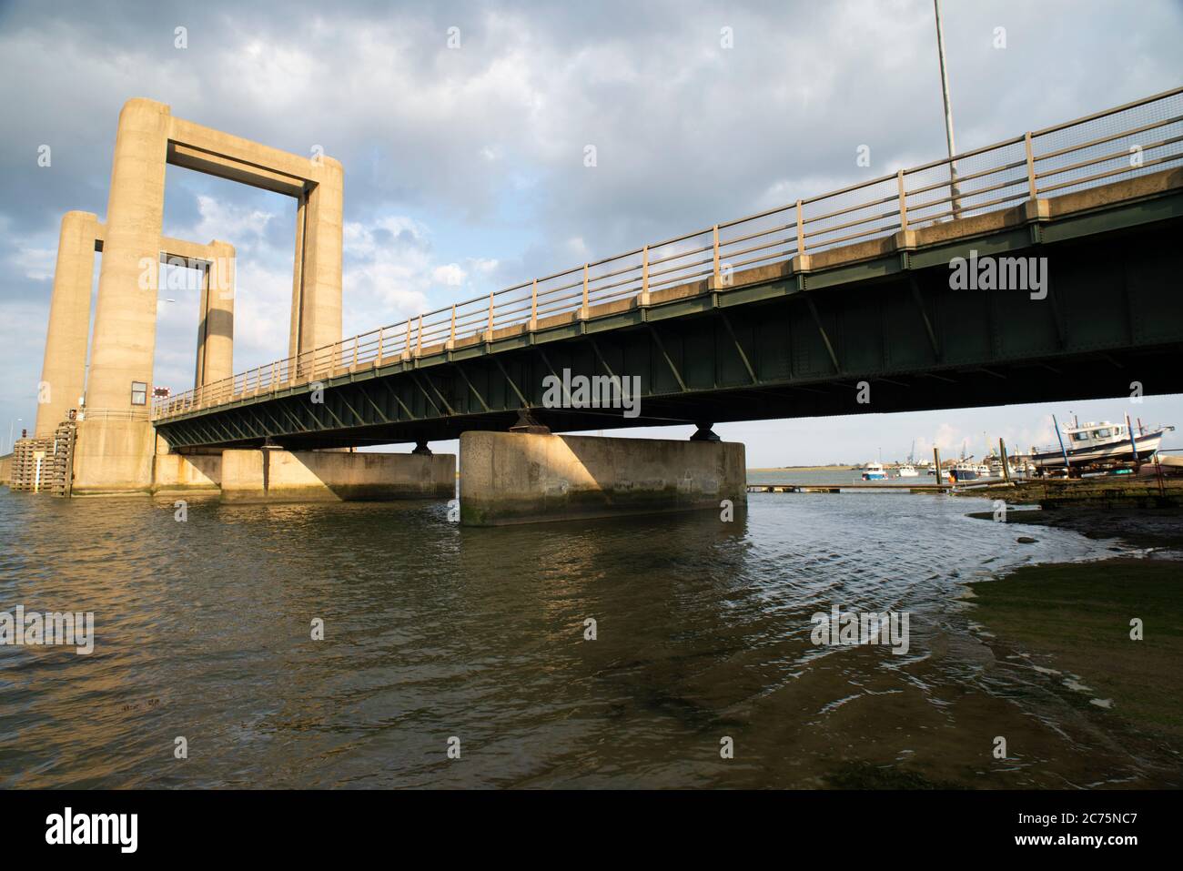 Sheppey Crossing and Kingsferry Bridge from waters level by the Swale ...