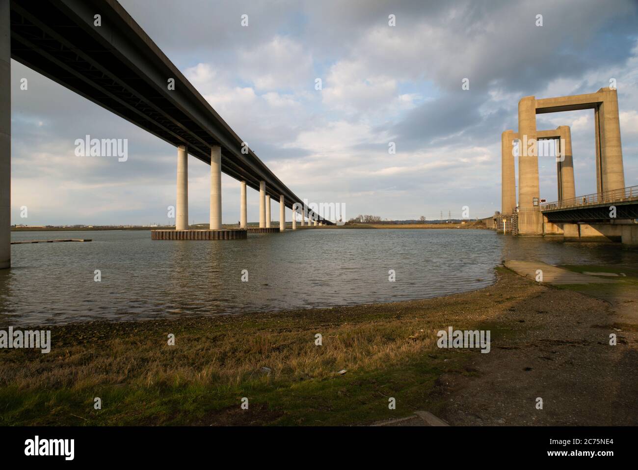 Sheppey Crossing and Kingsferry Bridge from waters level by the Swale ...