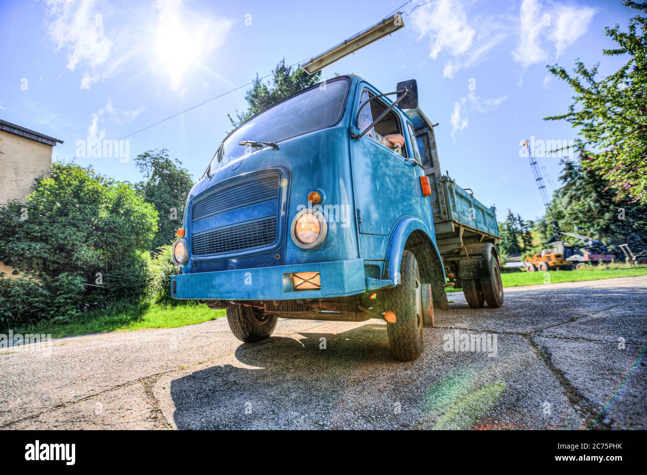 Blue italian truck stands on a street Stock Photo - Alamy