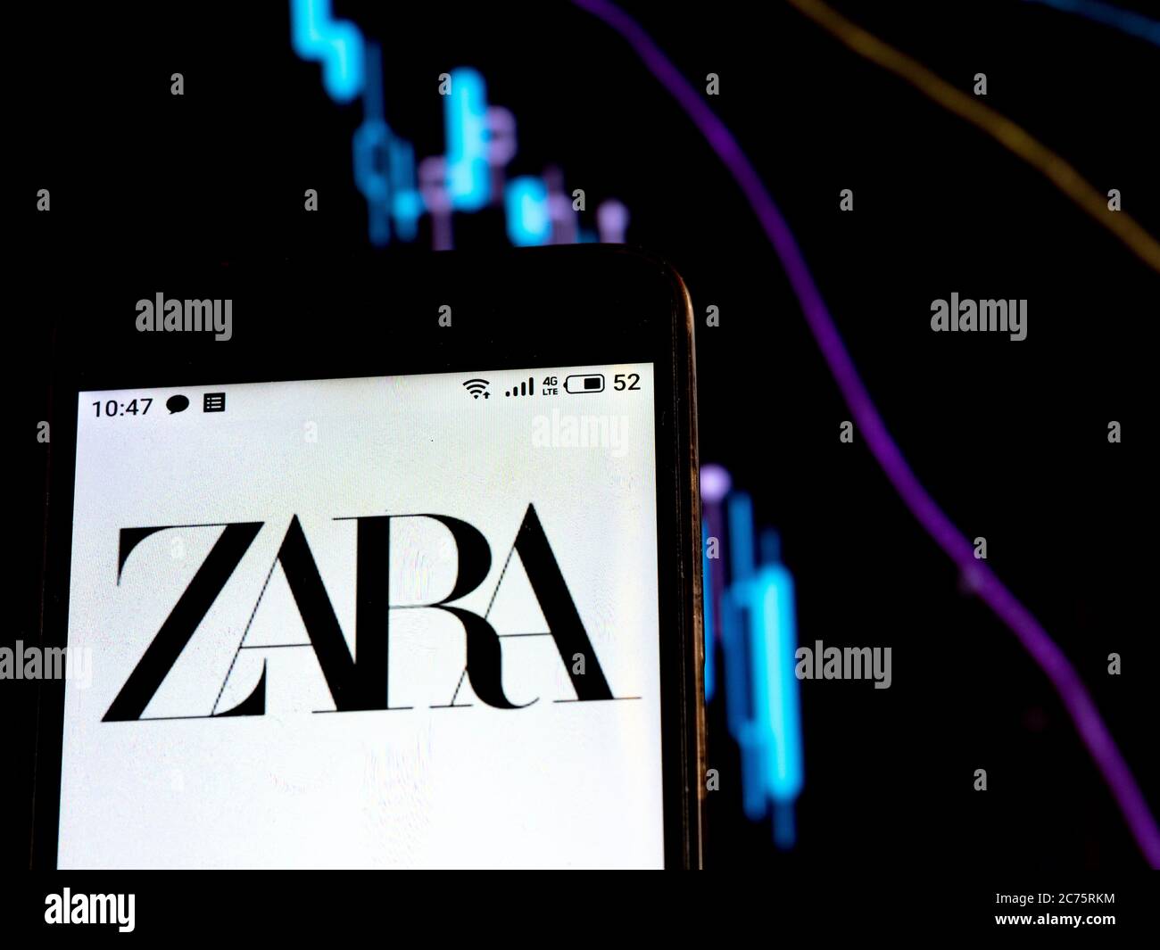 In this photo illustration Zara logo is seen displayed on a smartphone ...