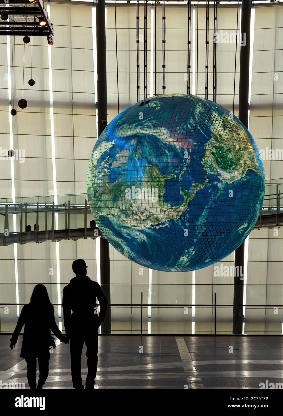 tokyo, japan - march 01 2020: Silhouette of a couple walking under the ...