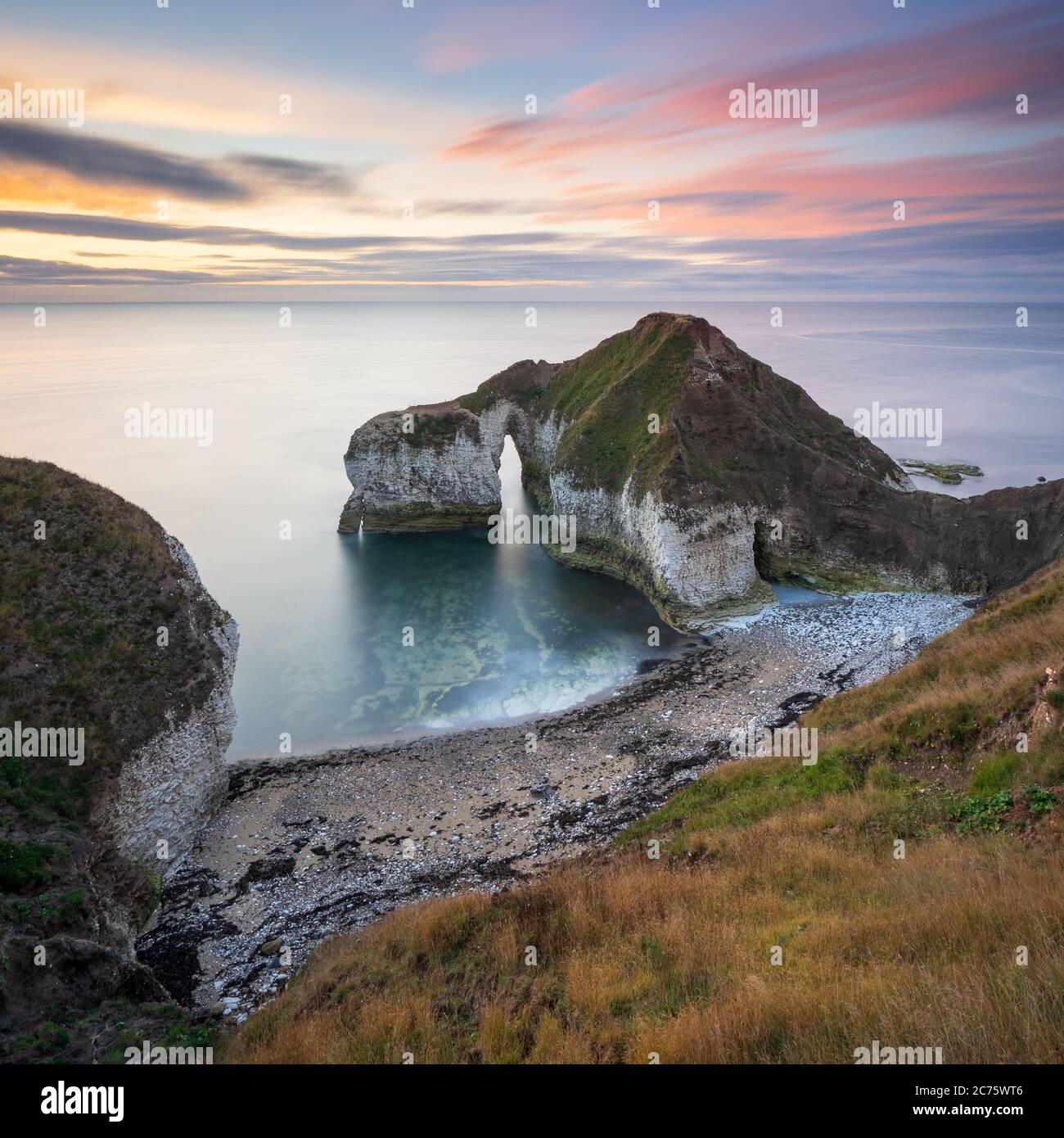 The iconic sea arch known as the 'Drinking Dinosaur' at Flamborough ...