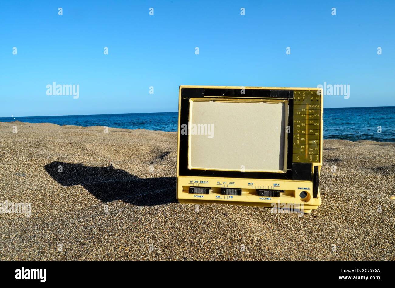 Photo Picture of a Television on the Sand Beach Stock Photo - Alamy