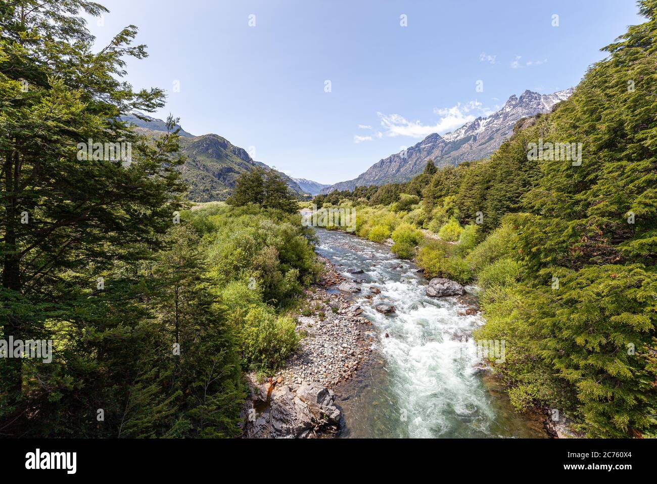 View of Emperador Guillermo river and mountains at Carretera Austral ...