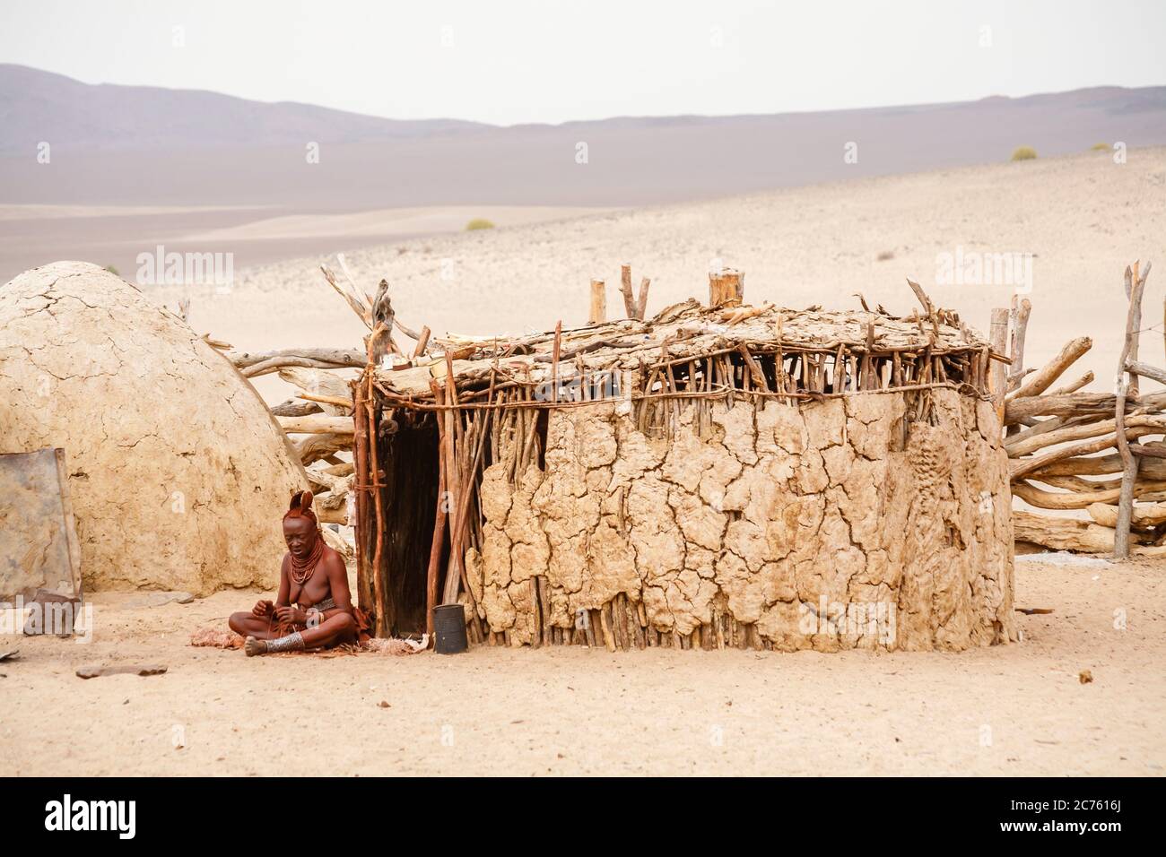 An old woman of the Himba tribe people indigenous to the Kunene Region ...