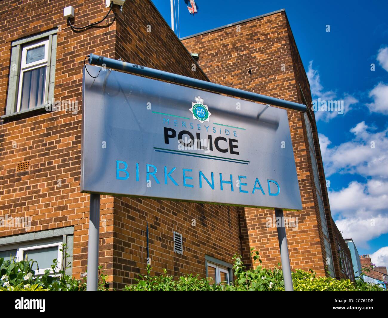 A sign outside the police station in Birkenhead - part of Merseyside ...