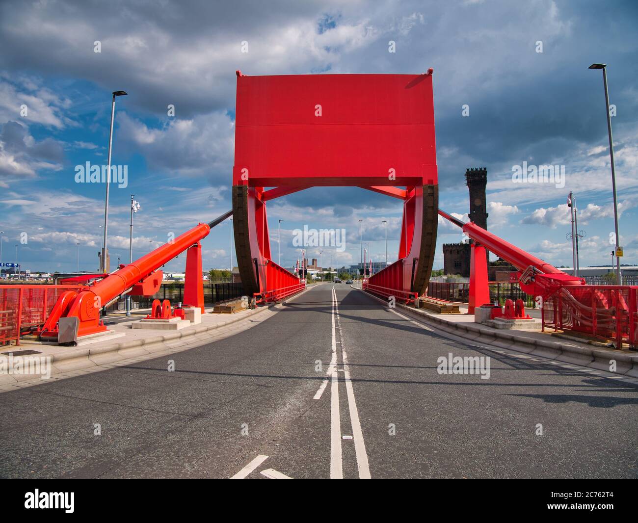 The counterweight and hydraulic rams of a red bascule bridge carrying ...