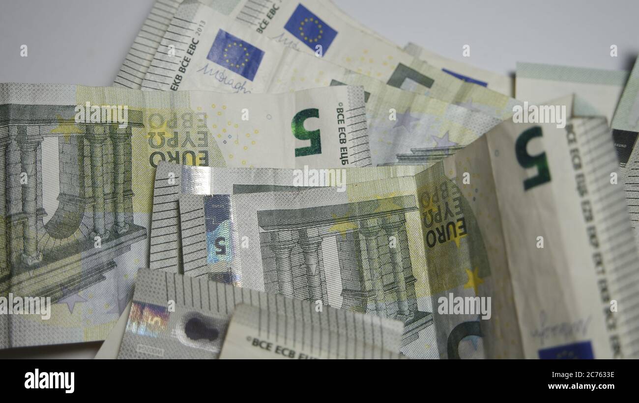 Five euro banknotes - European paper money - closeup Stock Photo - Alamy