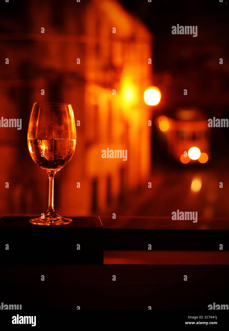 Wine glass on a window sill Stock Photo - Alamy