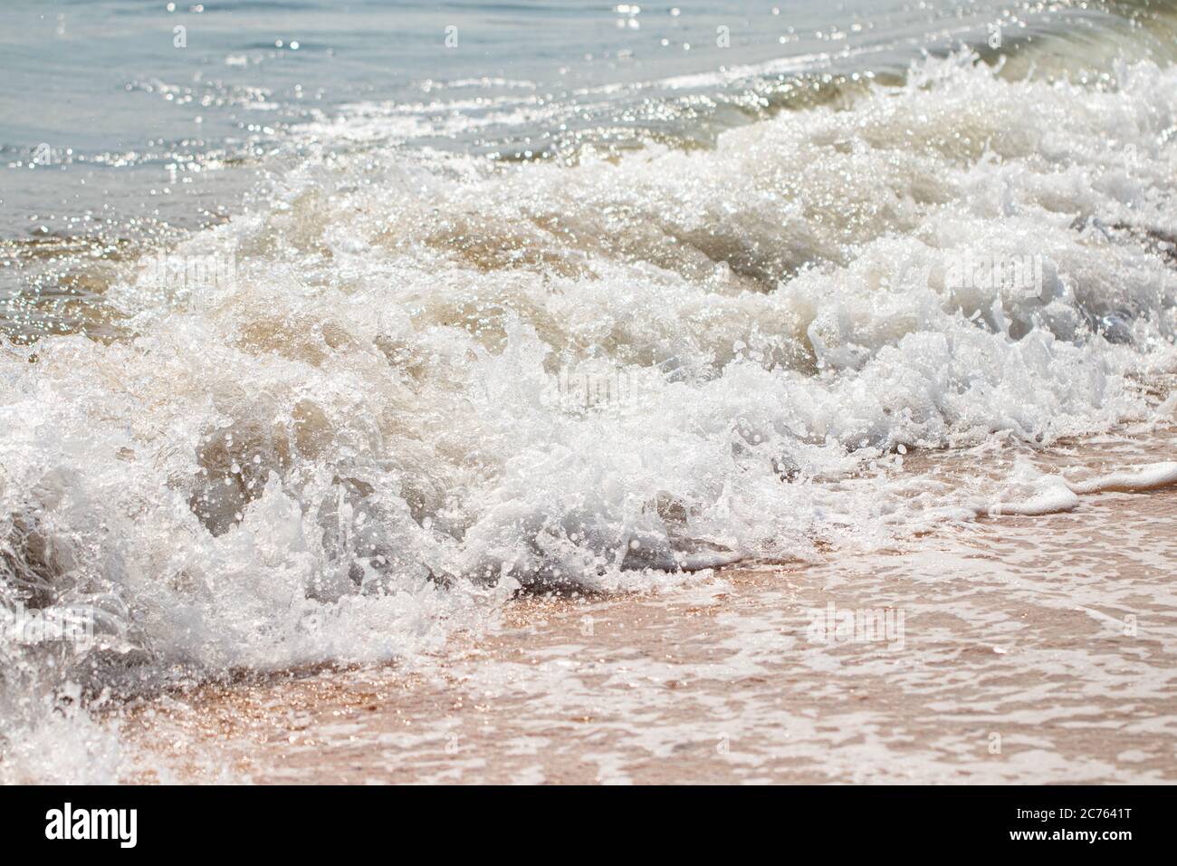 foaming sea wave on a sandy beach. Summer sea background Stock Photo ...