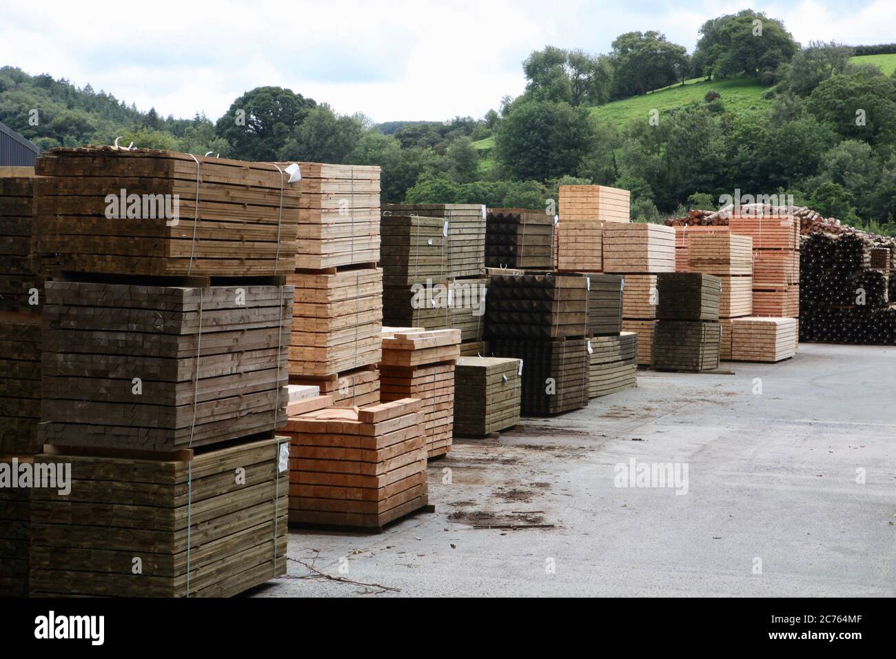 stacked timber in timber yard Stock Photo - Alamy