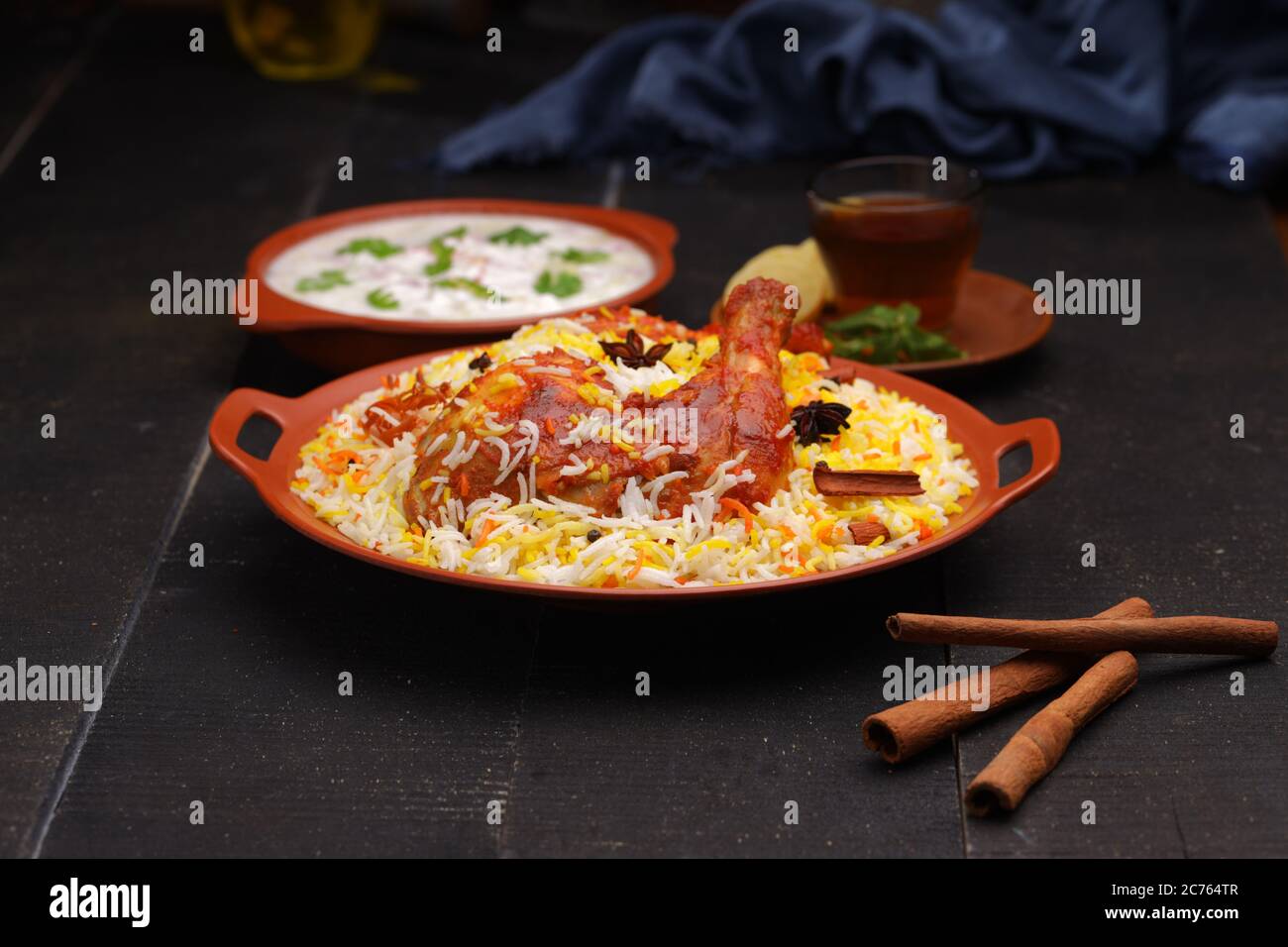 Chicken biryani , Tandoori chicken with basmathi rice and raita as side ...