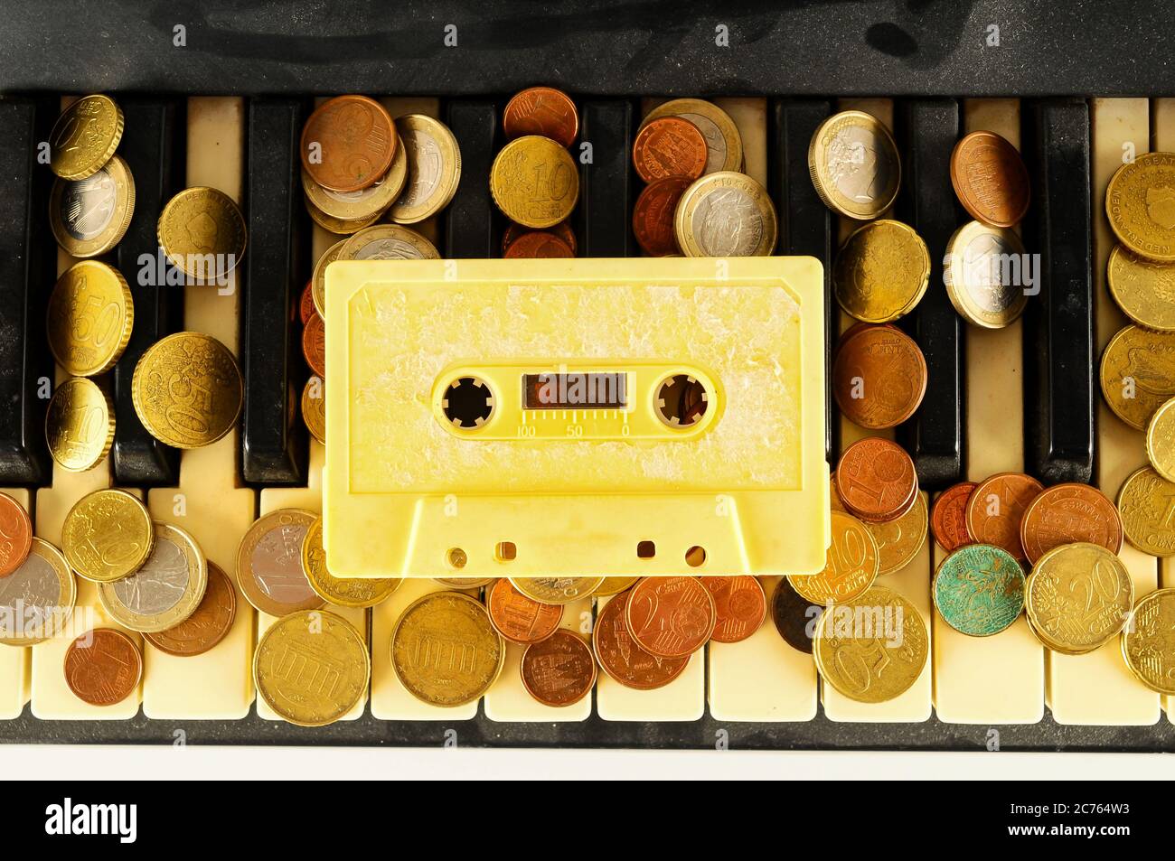 Photo picture close-up of piano keys keyboard and musicassette tape ...