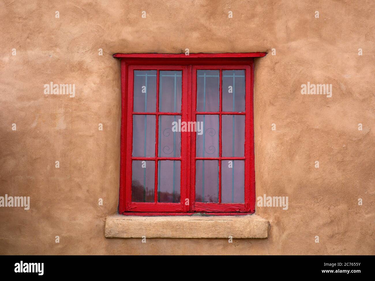 Red windows on an historic adobe house in Santa Fe, New Mexico Stock ...