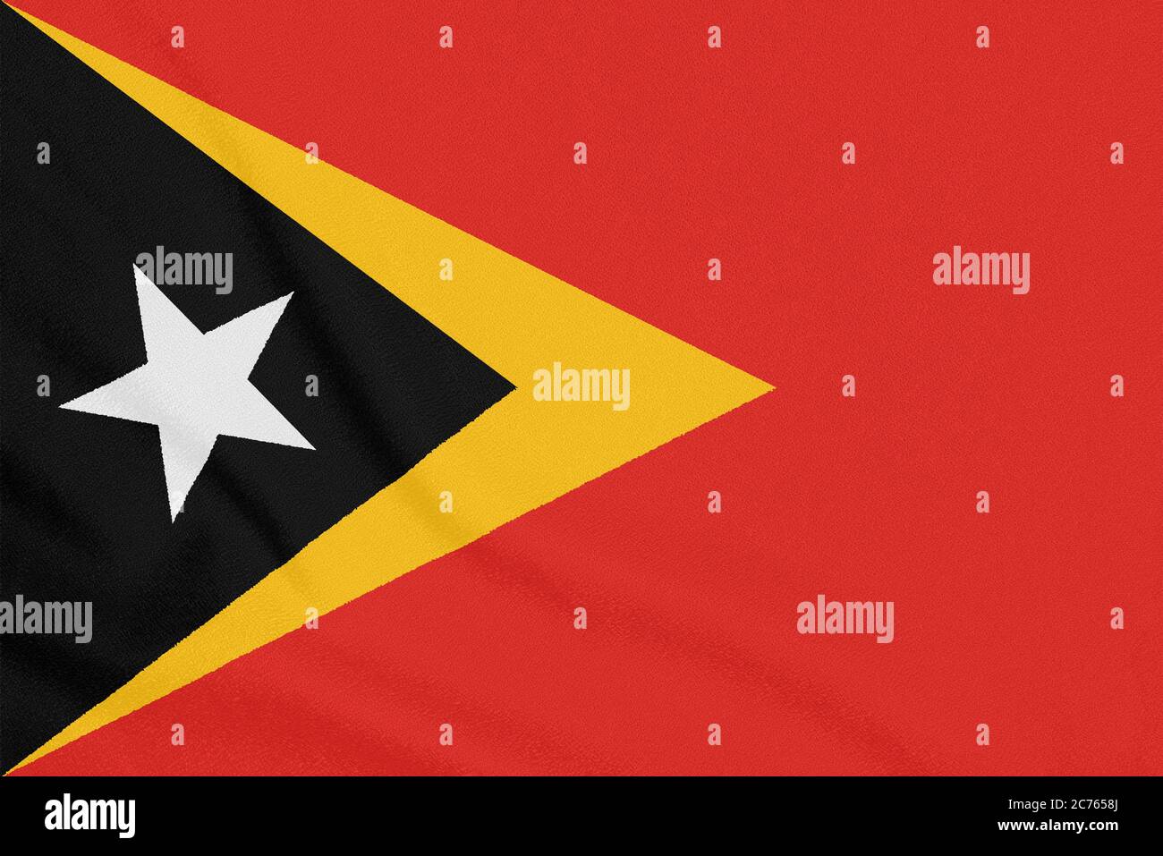 Flag of East Timor on textured fabric. Patriotic symbol Stock Photo - Alamy