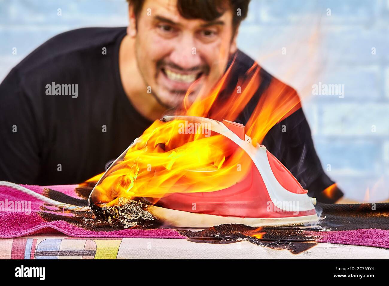 Burning clothes hi-res stock photography and images - Alamy