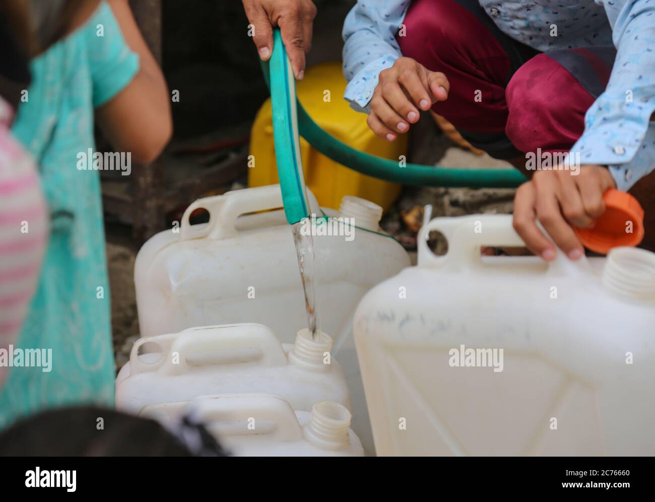 Taiz / Yemen - 17 June 2020 : Children fetch water due to the water ...