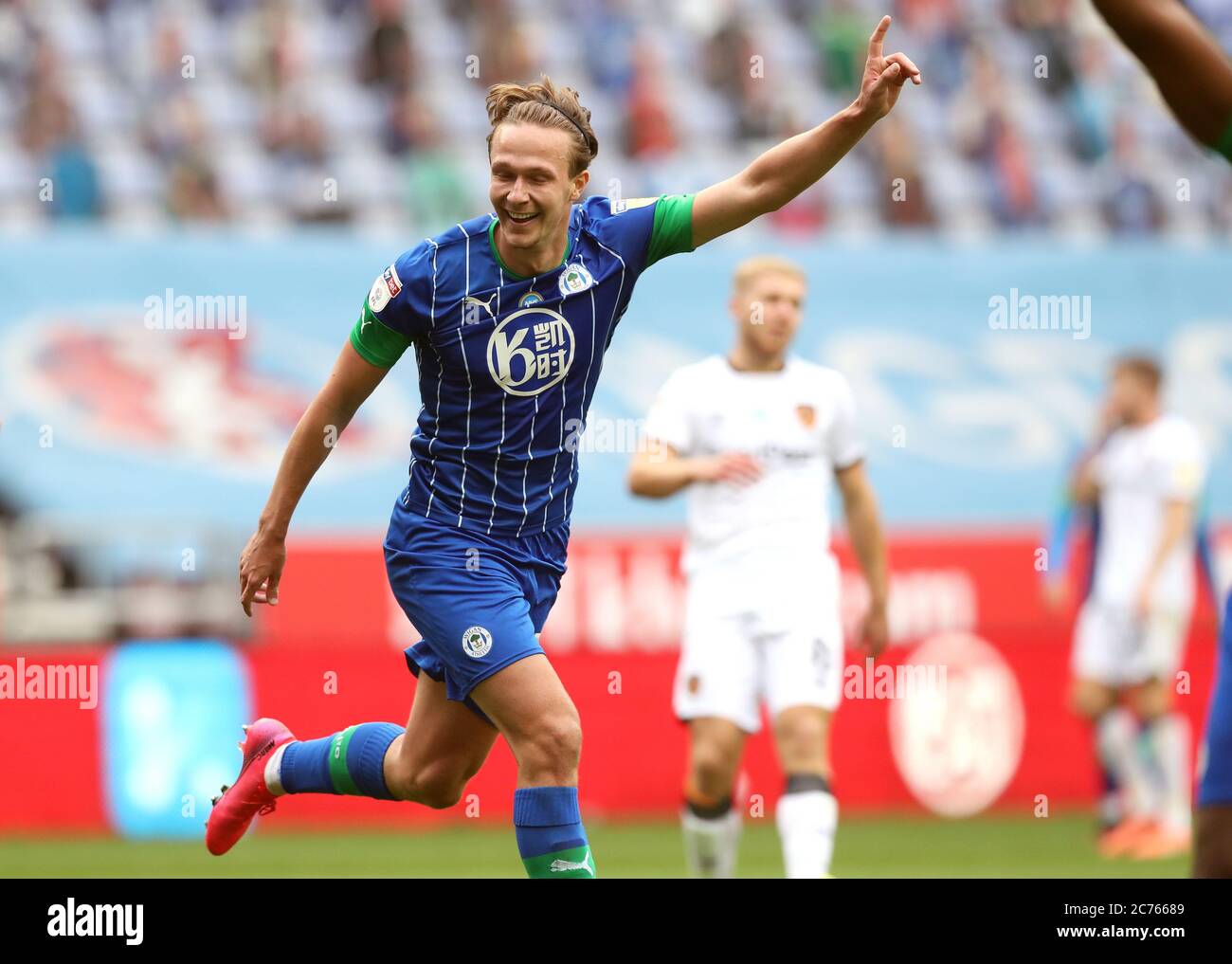 Wigan athletics kieran dowell celebrates scoring hi-res stock ...