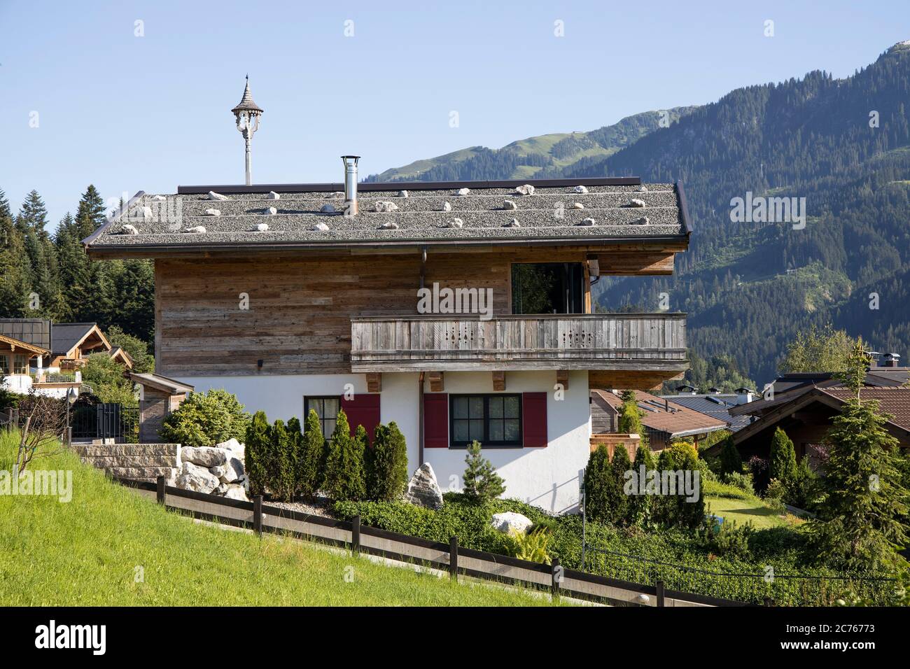 Traditional house in the Austrian alps near Kitzbuehel, Tyrol,Austria ...