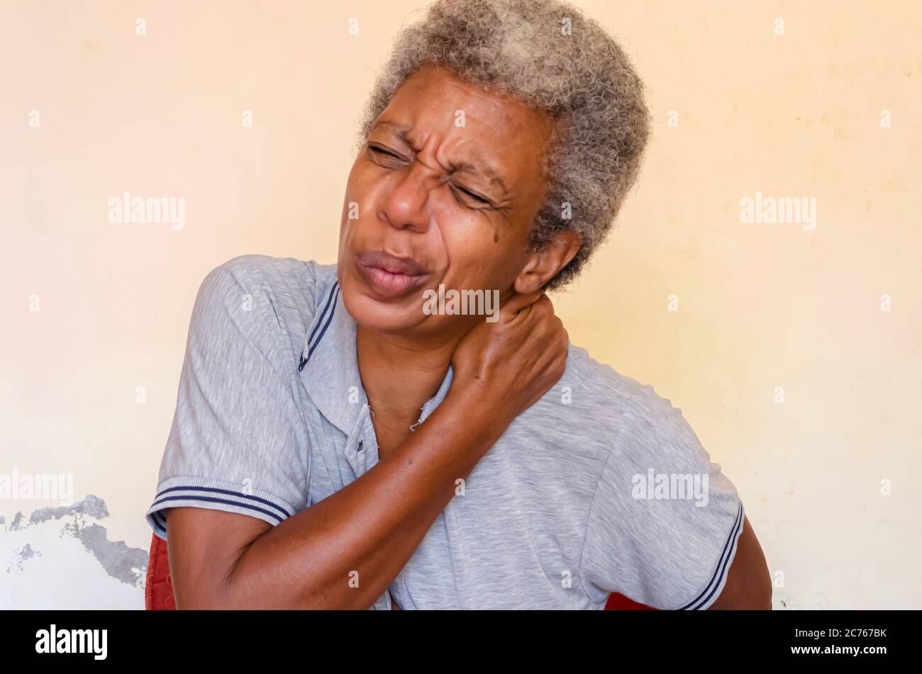 Excruciating Pain In Shoulder Stock Photo - Alamy
