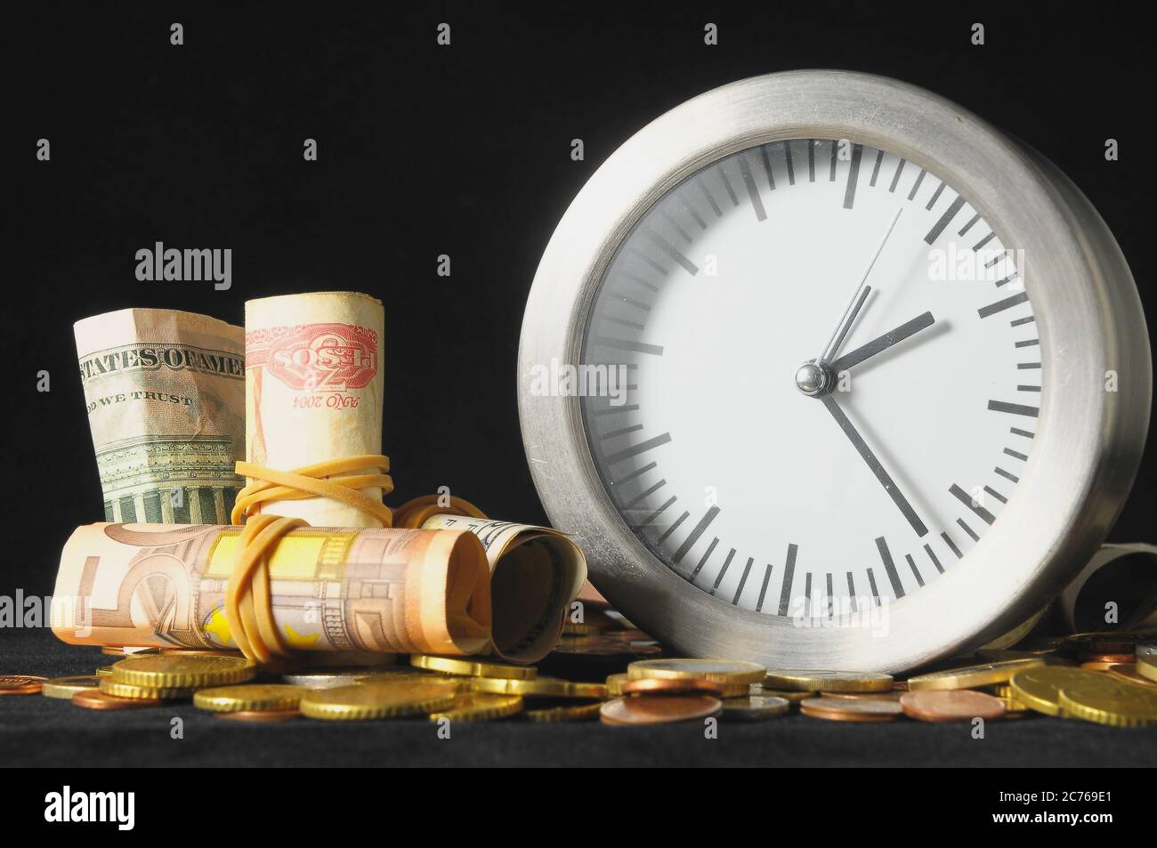 Time is Money Concept a Clock and Currency Stock Photo - Alamy