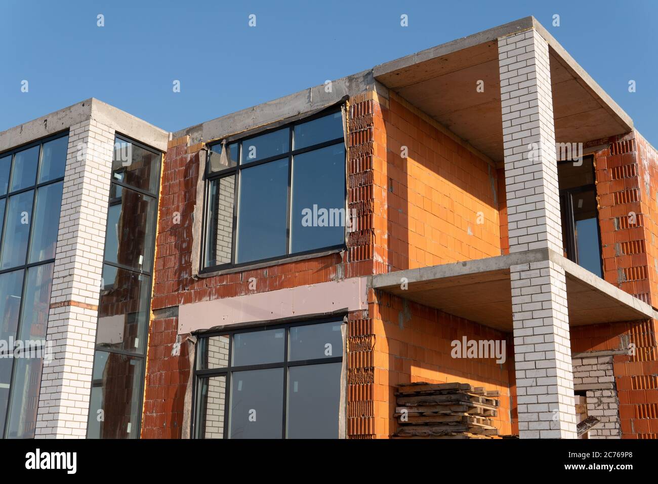 Close up of unfinished house in residential area. Modern architecture ...