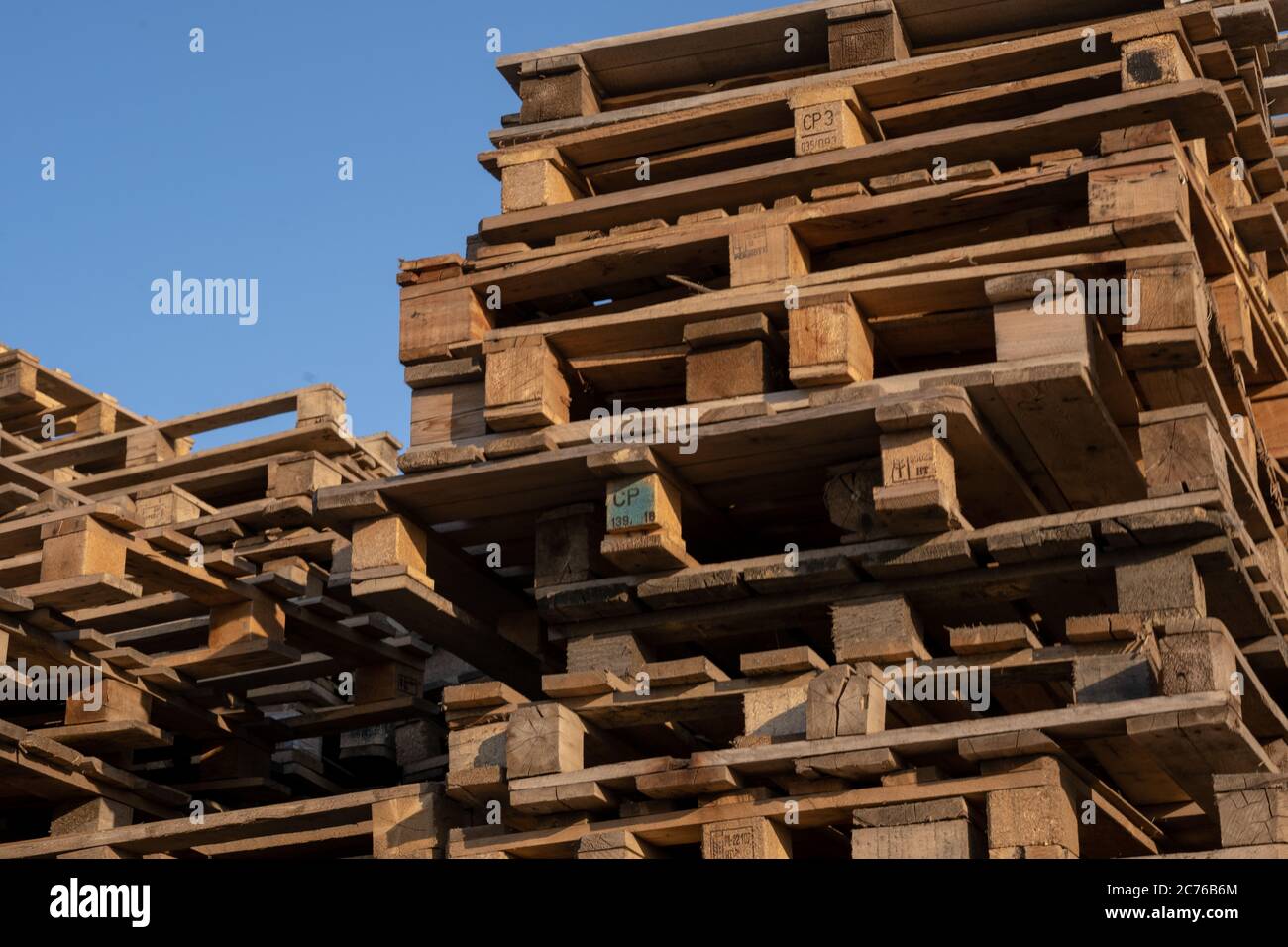 Wooden euro pallets for transfering goods to customers. Used wooden ...