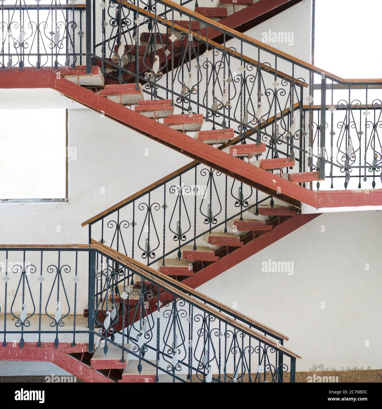 Ramp and staircases that turns inside a building, details of modern ...
